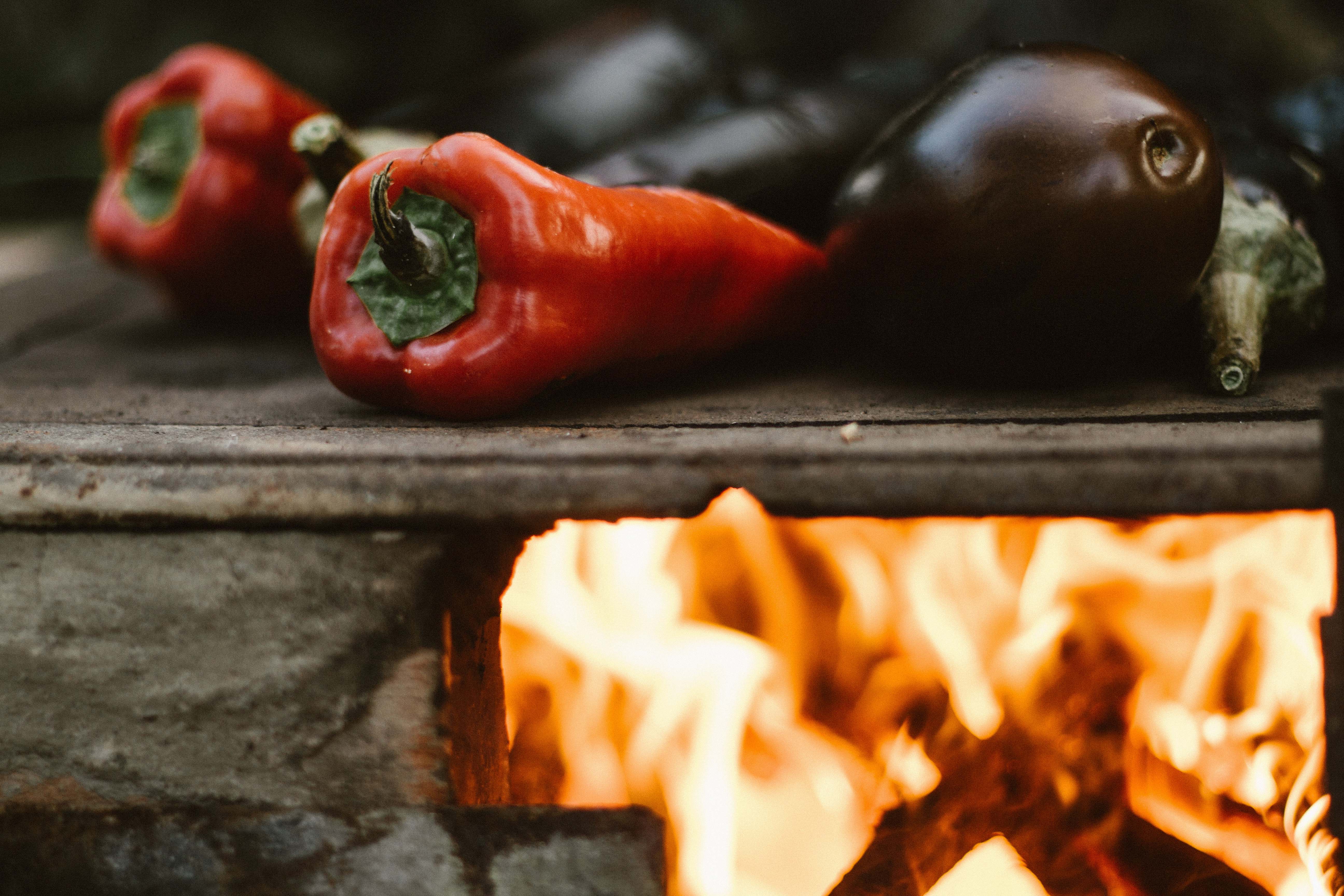 Vegetable Fire Roasting Eggplant And Chili Pepper Fire Image Free Photo