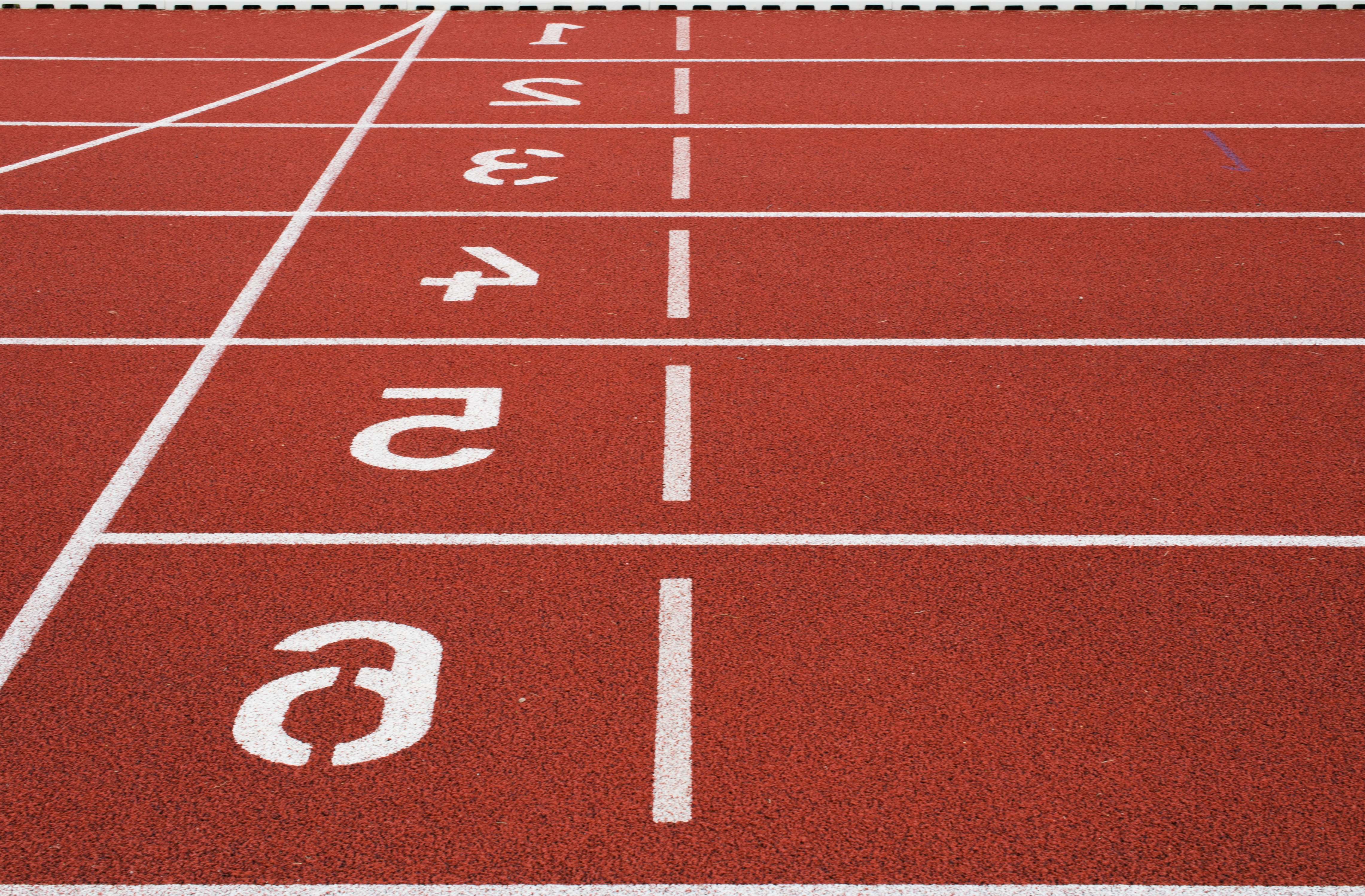 Sports Running Field During Daytime Numbers Image Free Photo