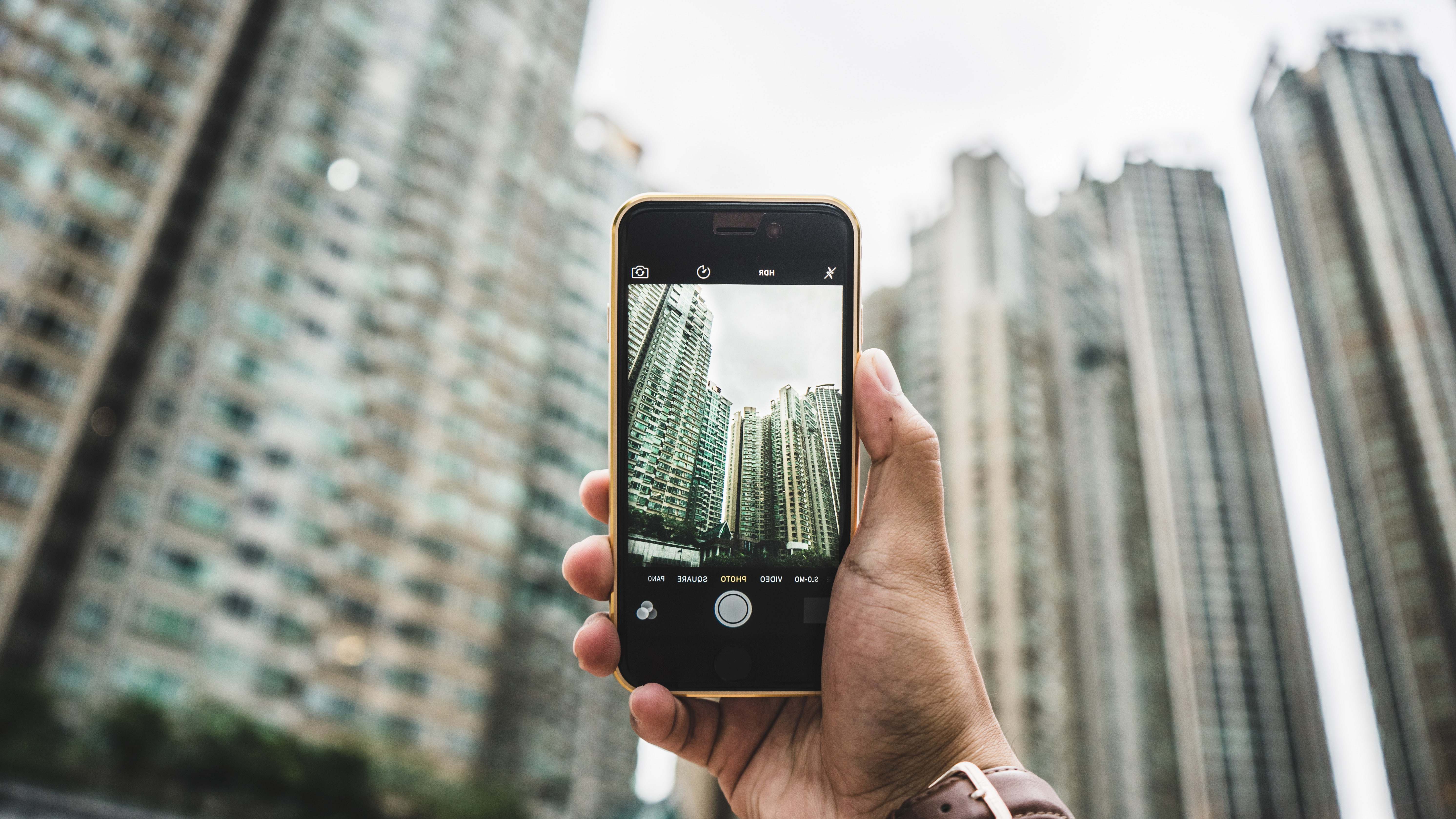 Cell Phone Person Using Smartphone Taking Picture Of Building Mobile ...