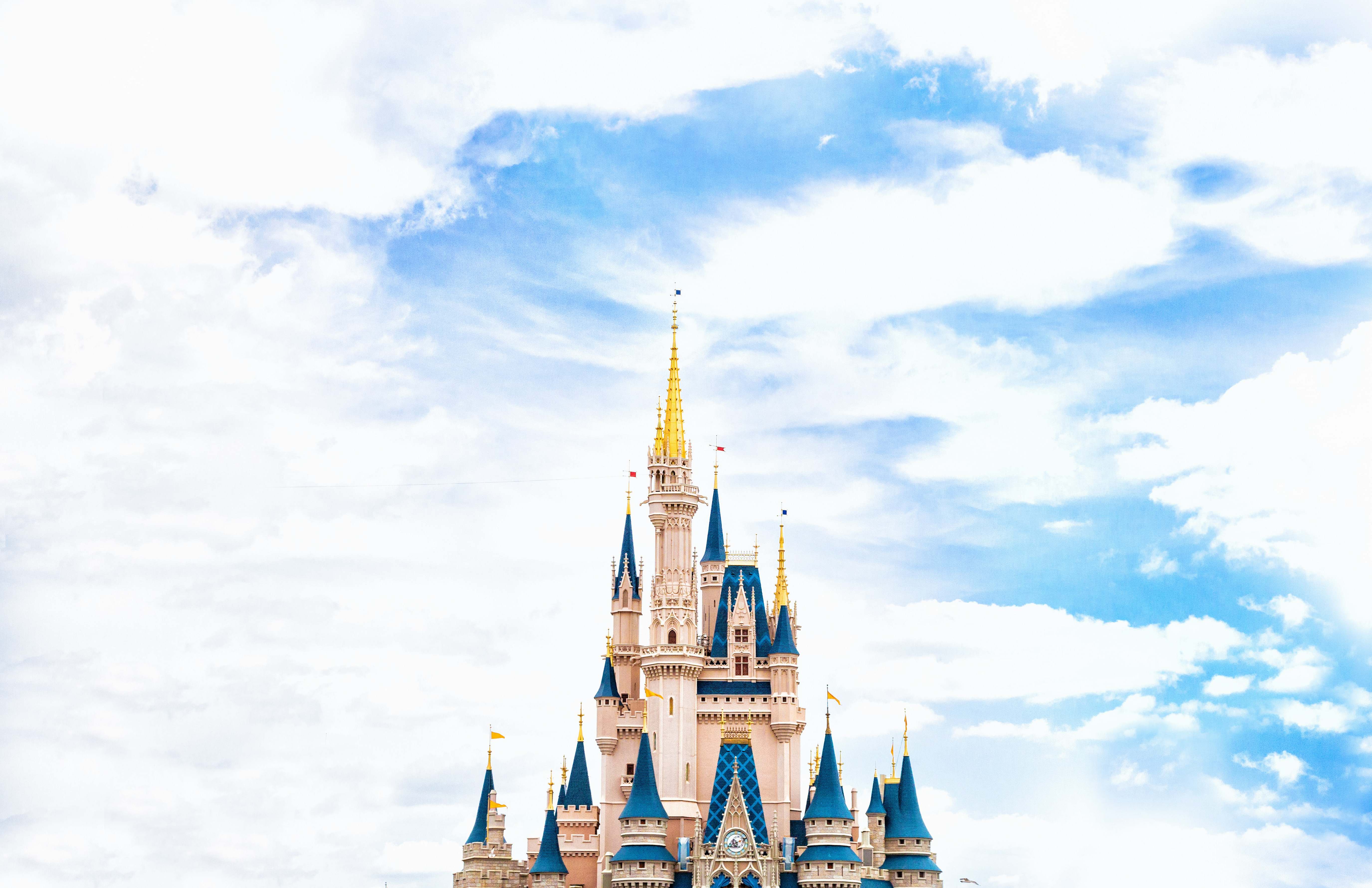 architecture landscape photography of Walt Disney castle under cloudy ...