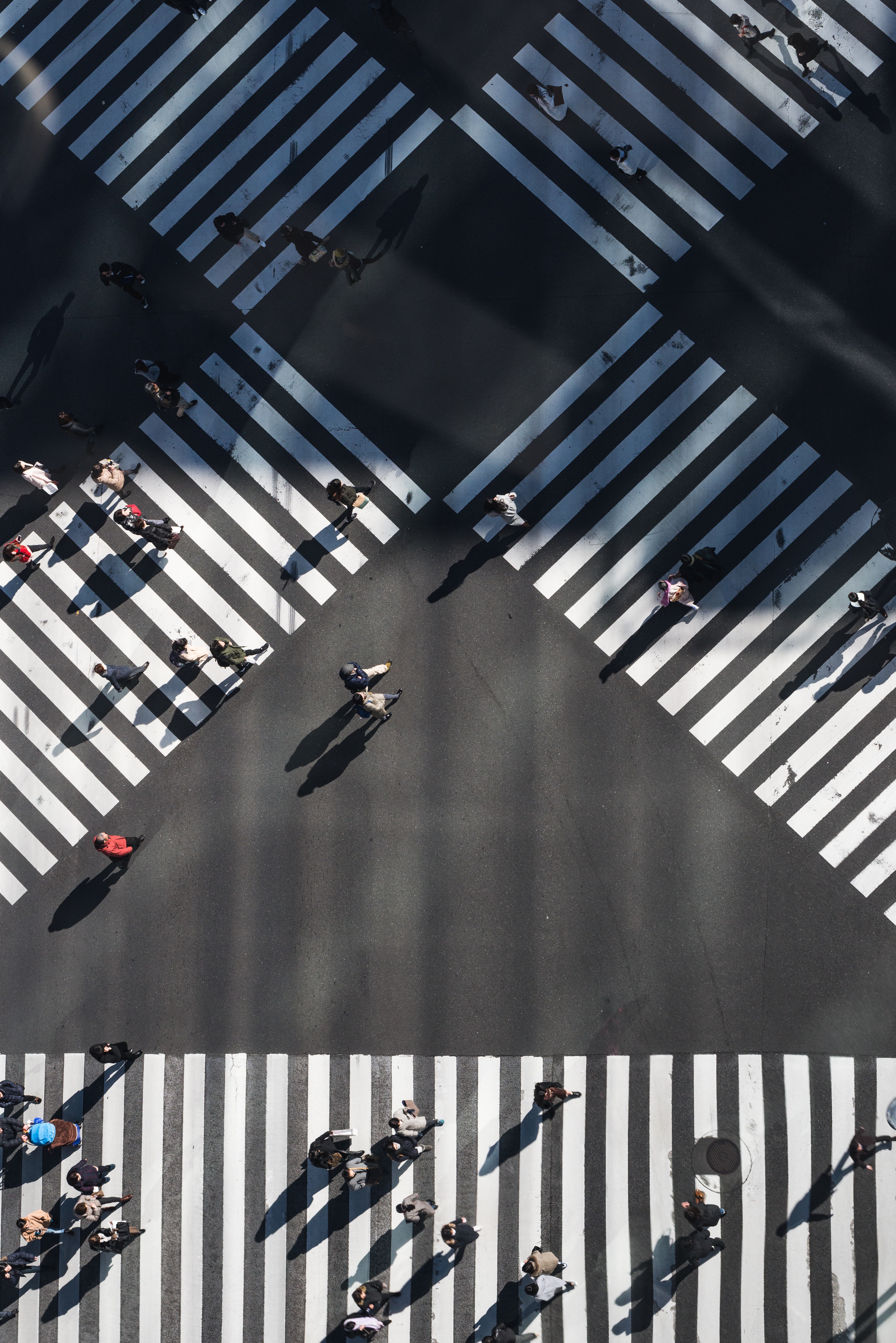 Aerial Photography Of People Walking In The Intersection Street During ...